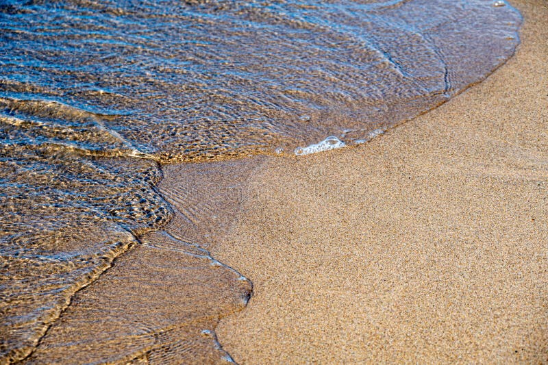 Water Ebbing and Flowing on Smooth Sandy Beach Stock Image - Image of ...