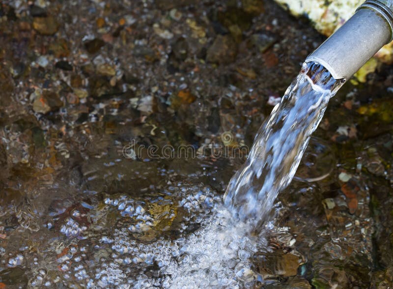 Water Emerging from a Pipe. Image Water Scarcity and Importance of ...