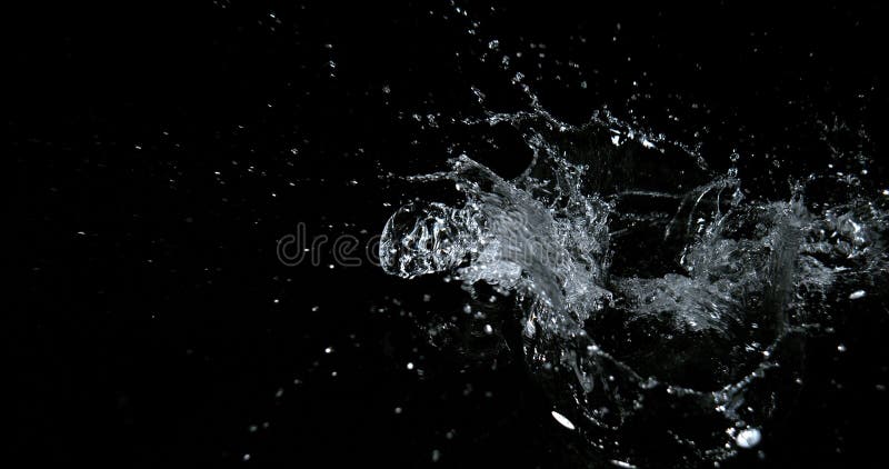 Water Exploding and Splashing Against Black Background Stock Image ...