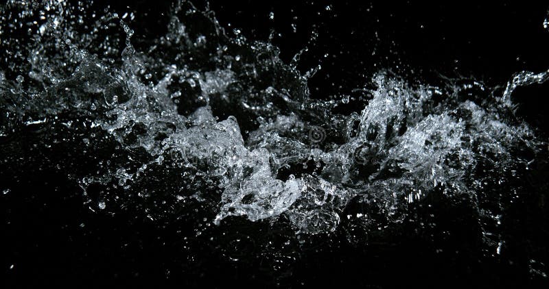 Water Exploding and Splashing Against Black Background Stock Image ...