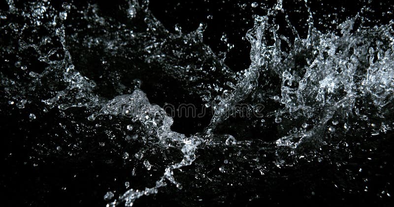 Water Exploding and Splashing Against Black Background Stock Image ...