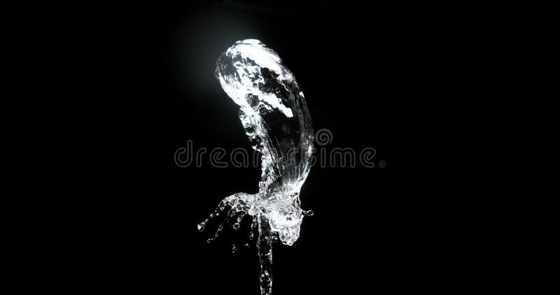 Water Exploding and Splashing Against Black Background, Slow Motion ...