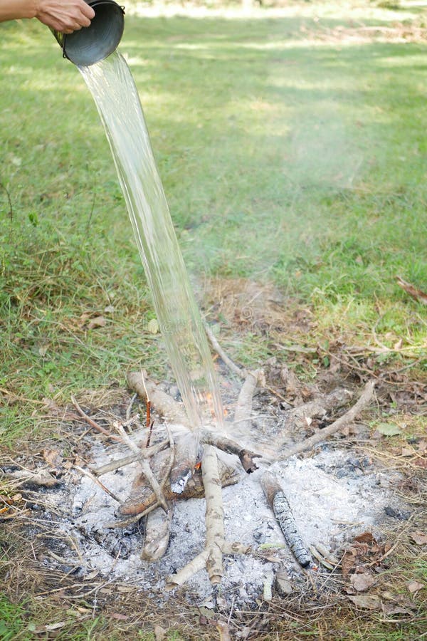 Water Extinguish a Fire from a Bucket Stock Image - Image of smoldering ...
