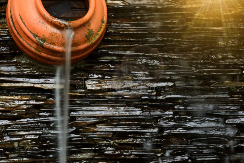 Water Fall at Decorative Wall Made with Basin Clay . Stock Photo ...