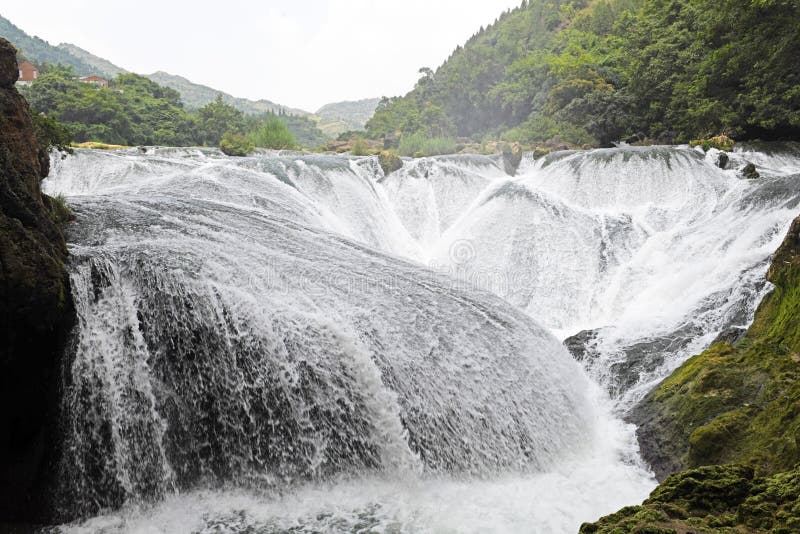 Waterfall in slow motion stock photo. Image of lake - 160014676