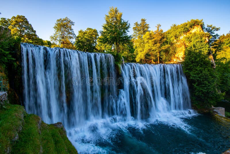The Water Fall from the Top of the Hill into the River Stock Photo ...