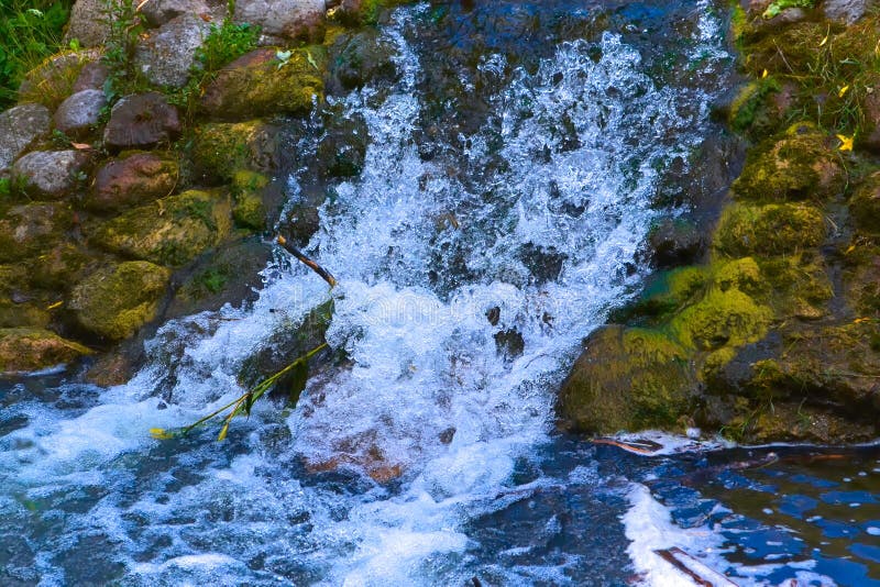 Water Falling Against Rocks and Splashing. Stock Photo - Image of ...