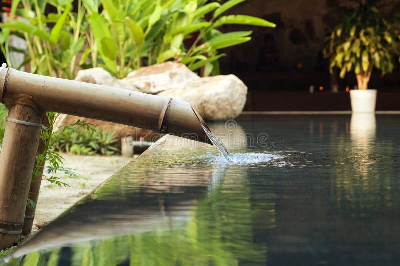 Water Falling Down from Bamboo Pipe Stock Photo - Image of stone, feng ...