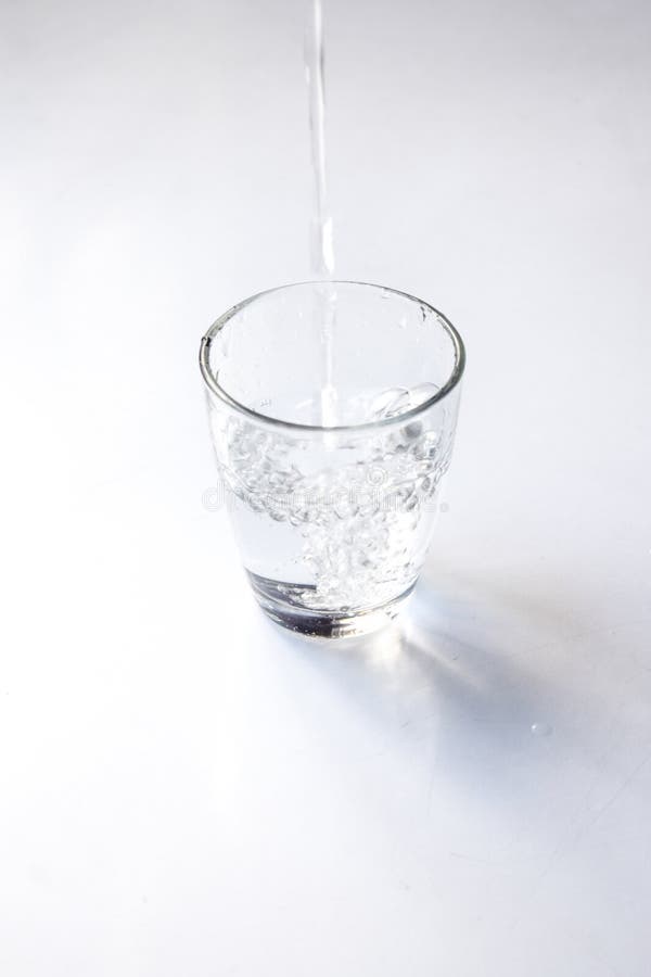 Water falling in glass stock image. Image of beer, water - 178629911
