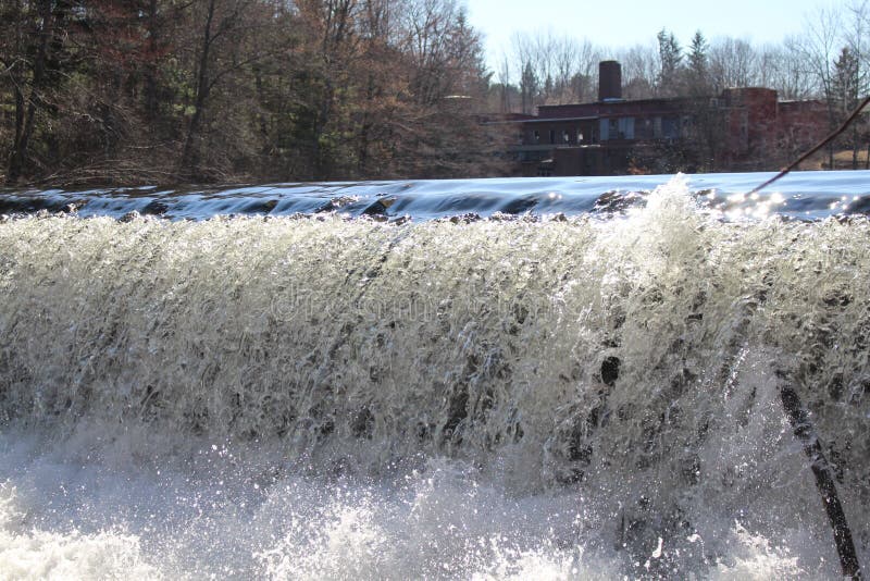 Water Falling Over Mill Dam Stock Image - Image of logs, falling: 88945253