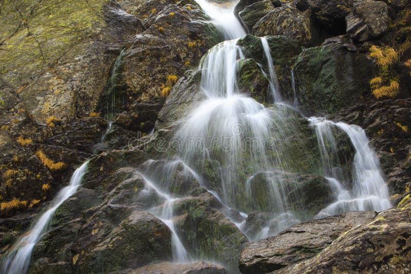 Water Falling Over the Rock Stock Photo - Image of black, river: 99385026