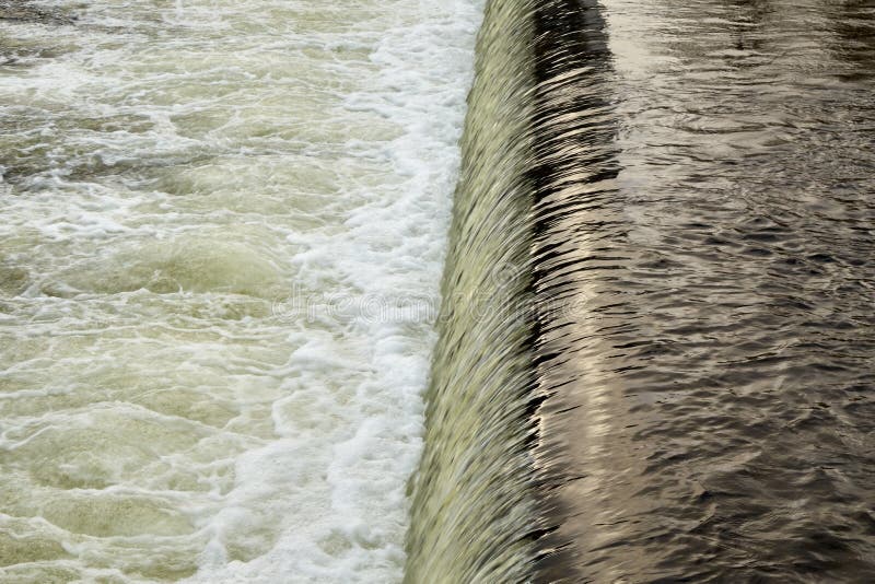 A small weir on a river stock image. Image of waterway - 206818975