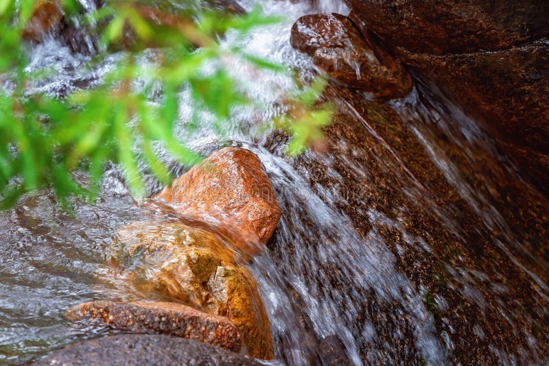 Water Falling Over Rocks stock photo. Image of mountain - 188544084