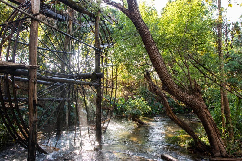 Water Falling from the Water Wheel into the Forest Stock Image - Image ...