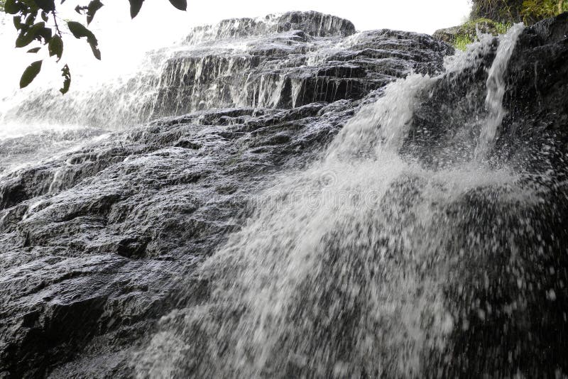 Water Falling from a Waterfall on the Rocks Stock Photo - Image of ...