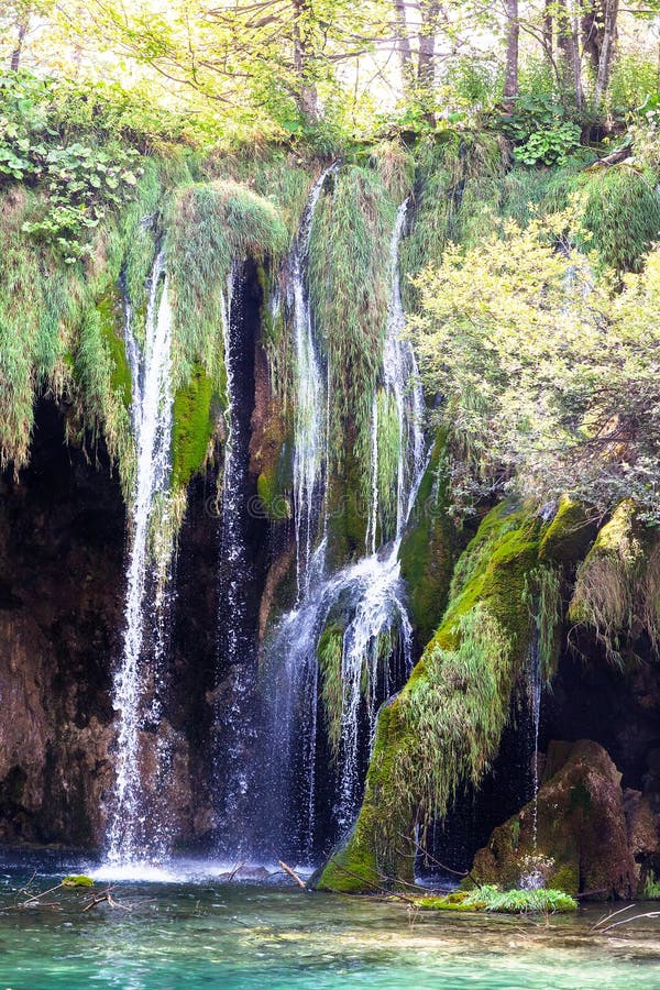 Water that Falls from a Large Waterfall Over Stone Slopes, Plitvice ...