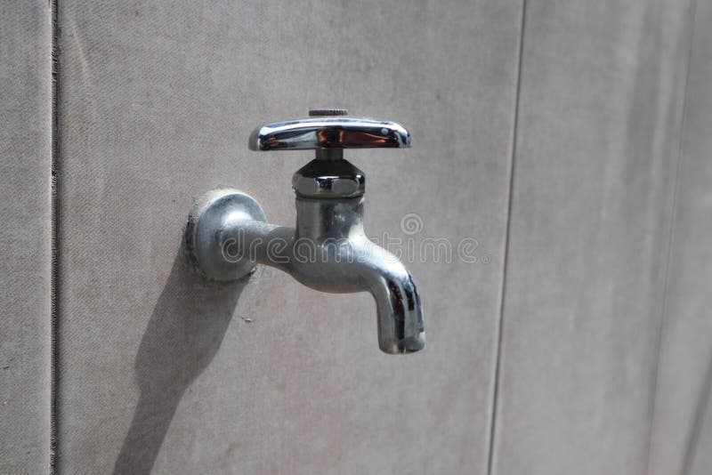 Water Faucet or Water Tab on Ceramic Wall. Stock Photo - Image of clean ...