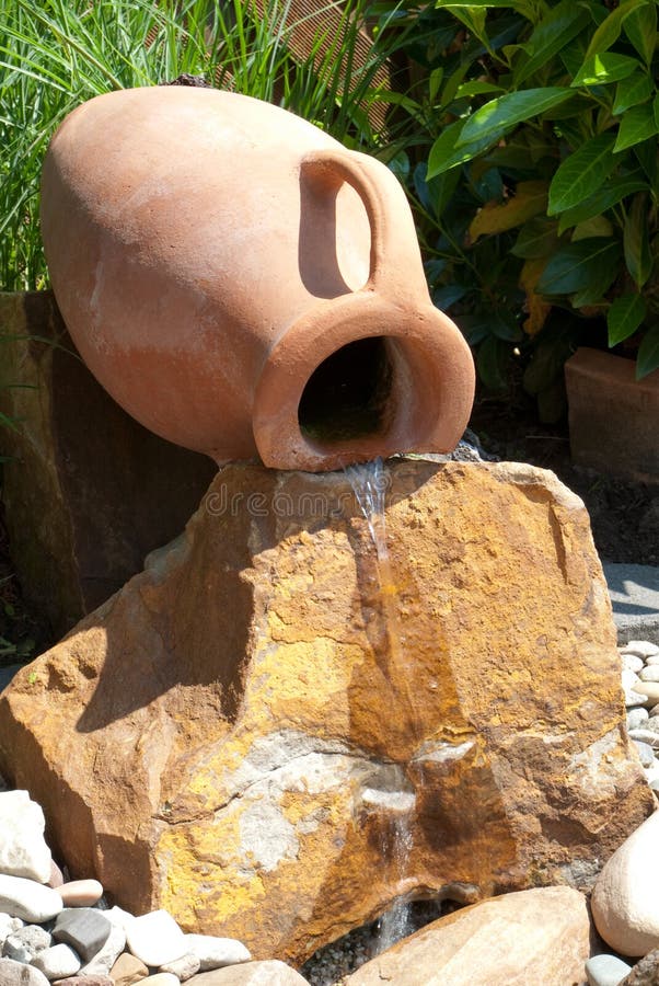 Water Feature with an Amphora Stock Image - Image of feature, sunny ...