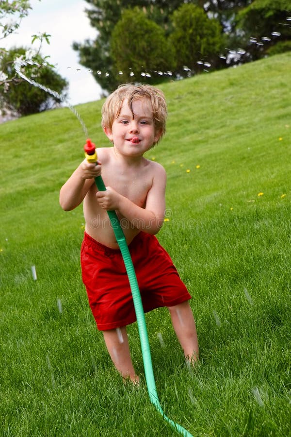 Water fight stock photo. Image of face, hose, cold, active - 2622944