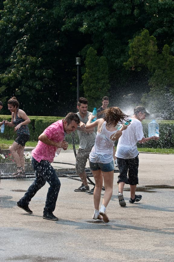 Wet Happy Teenagers at a Water Fight in Herastrau Park Editorial Photo ...