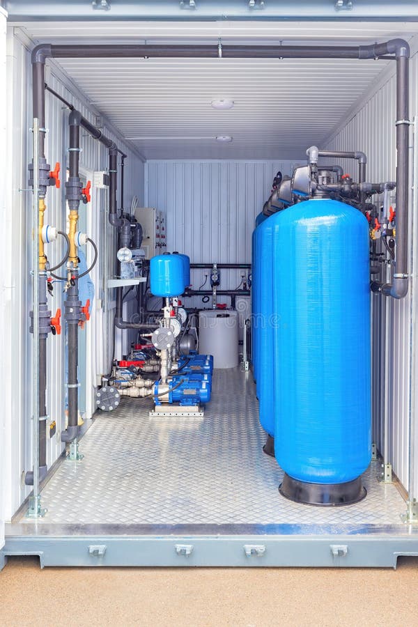 Industrial Water Filtration System Inside Container with Blue Tanks ...