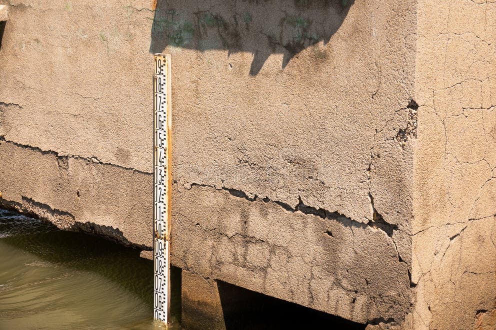 Water Flood Meter in a Pond Stock Photo - Image of monitor, ruler ...