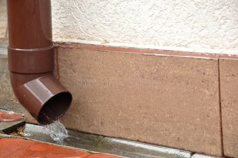 Water Flow from the Drainpipe, Installed on Wall Stock Photo - Image of ...