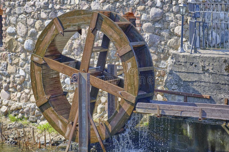 The Water Flow Driving the Water Mill Wheel Stock Image - Image of ...