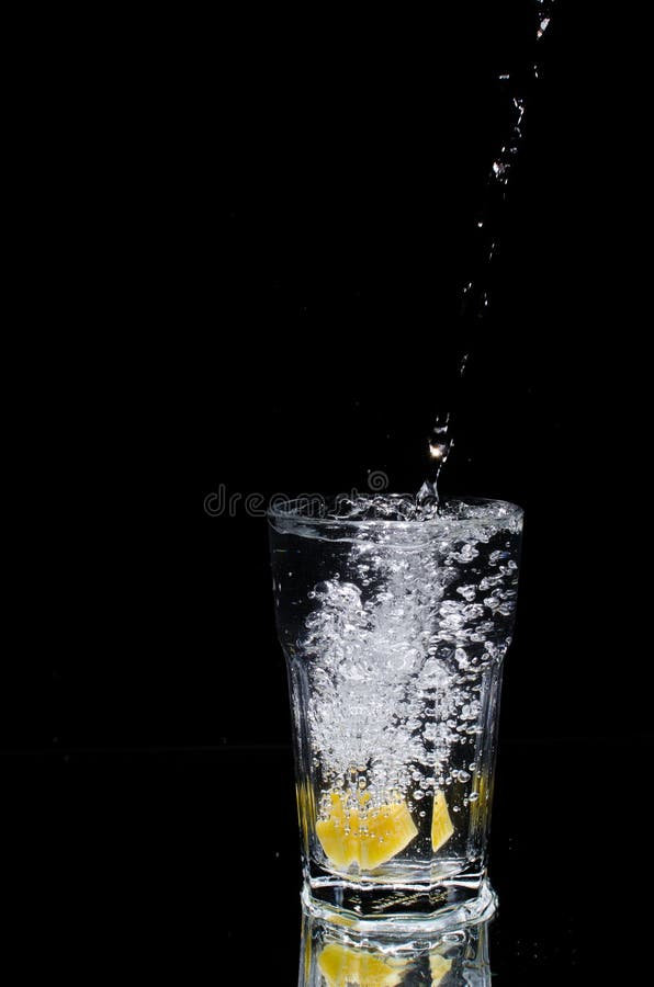 Water flow in a glass stock image. Image of bubble, motion - 71343587