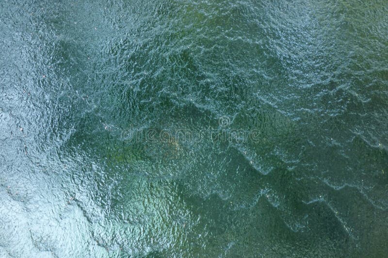 Flowing water flow pattern stock photo. Image of surface - 210111912