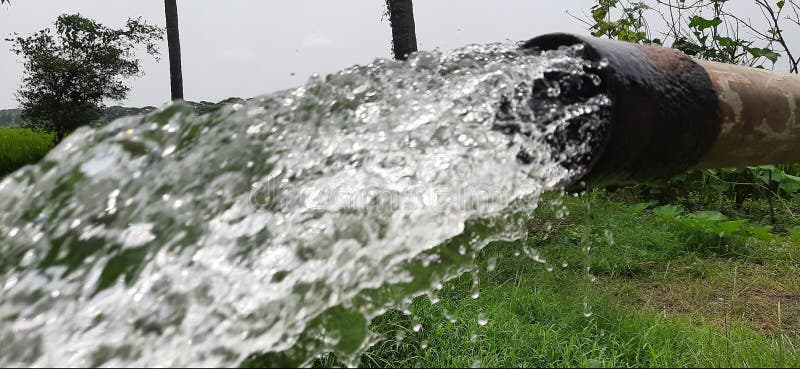 Water Flow from Pump , with Abstract Green Stock Photo - Image of pump ...