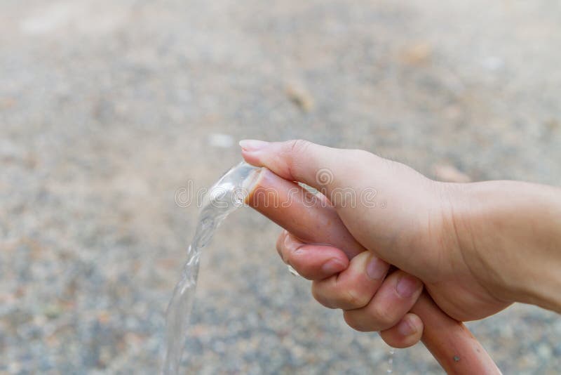 Water Flow from Rubber Pipe Stock Photo - Image of outdoor, plant: 70144422