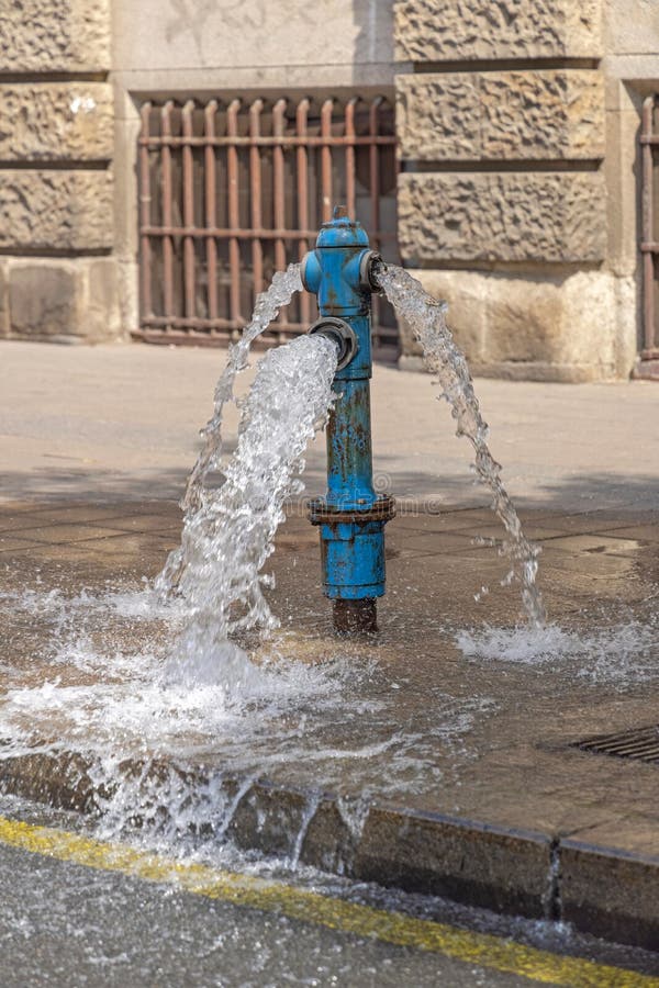 Water Pressure Hydrant stock image. Image of pavement - 233604387