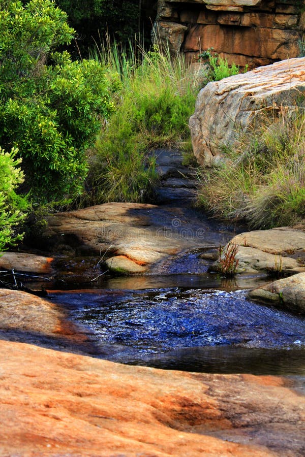 Water flowing across rocks stock photo. Image of rough - 40079688