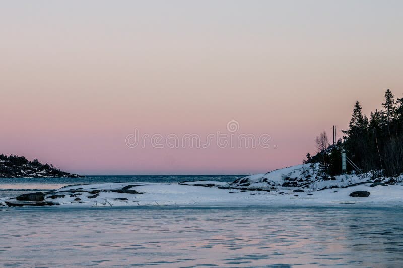 The Water is Running into the Middle of a Frozen Bay Stock Image ...