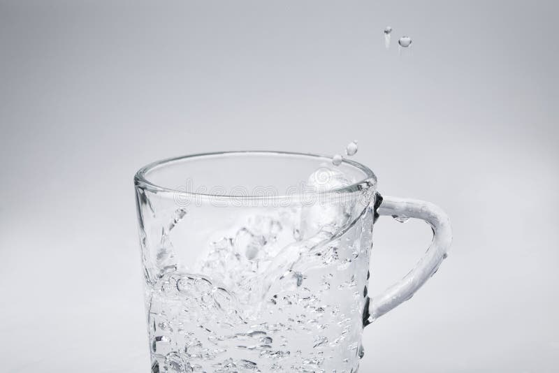 Water flowing into the cup stock photo. Image of clean - 106714674