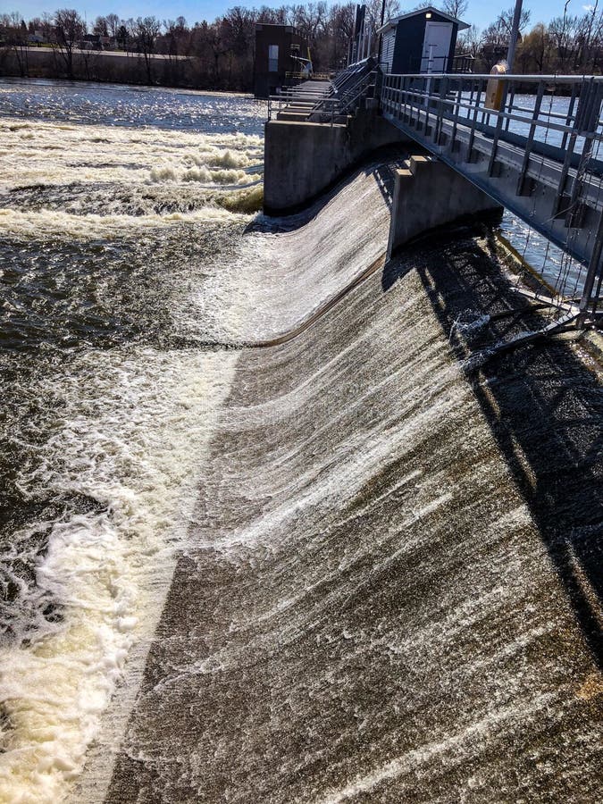 Water flowing down dam stock photo. Image of forms, streaming - 180451686