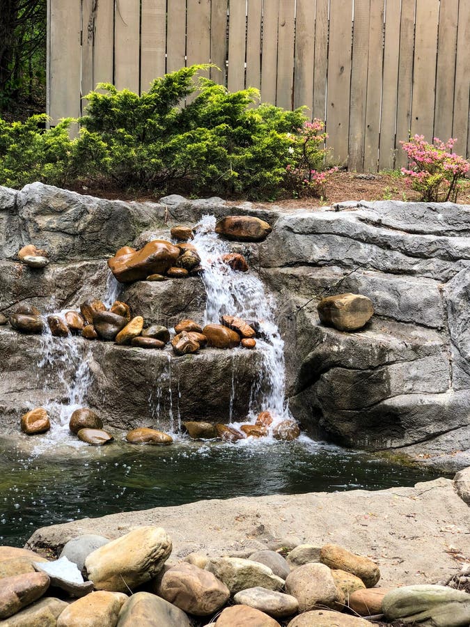 Water Flowing Down Rocks Into Pond Stock Image - Image of ature, cute ...