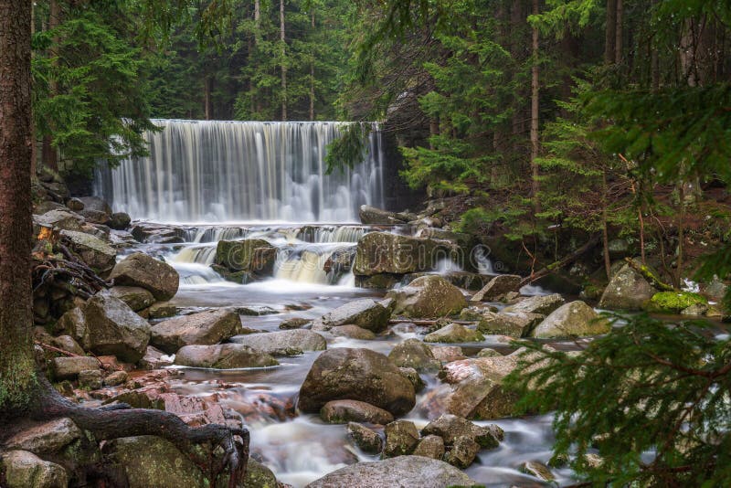 Cascading Water Tumbles Gracefully Down Waterfall, Creating Mesmerizing ...