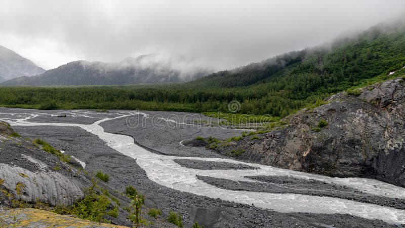 Alaskan melting glacier stock photo. Image of hiker - 261509502