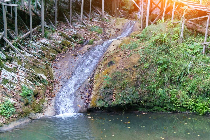 Water Flowing or Falling Down in the Waterfall. Natural Background ...