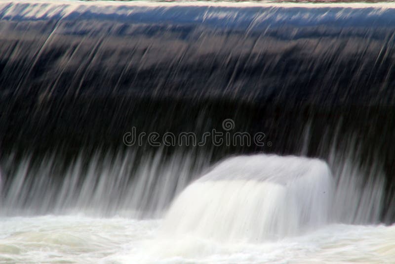 Water Flowing Fast Over a Rock in a River Stock Image - Image of fast ...