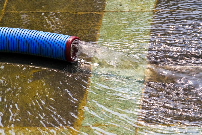 Water Flowing Out of the Pipe Spread on the Concrete Floor Stock Photo ...