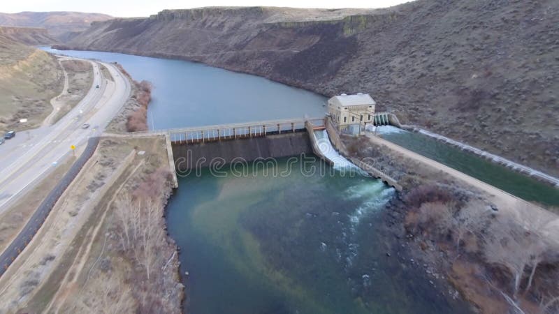 Water Flowing Over Flood Gates of a Dam Stock Video - Video of ...