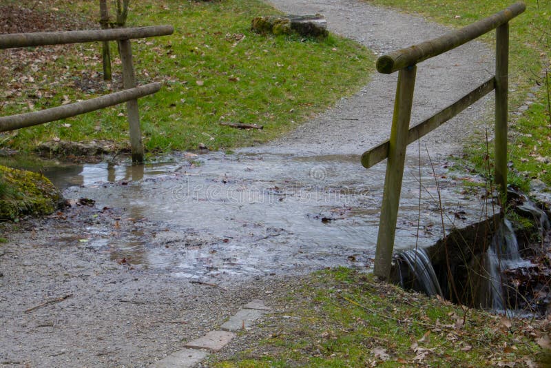 Water Flowing Over a Flooded Small Footbridge Stock Photo - Image of ...