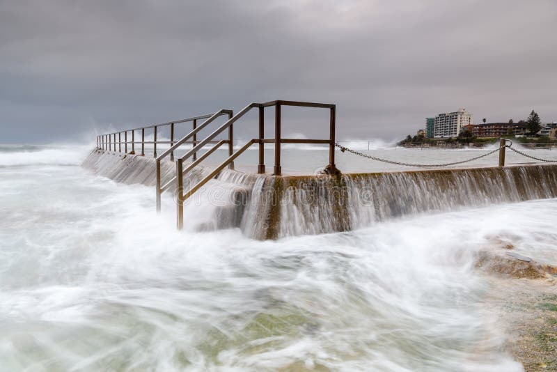 Water Flowing Over an Ocean Swimming Pool Stock Photo - Image of blue ...