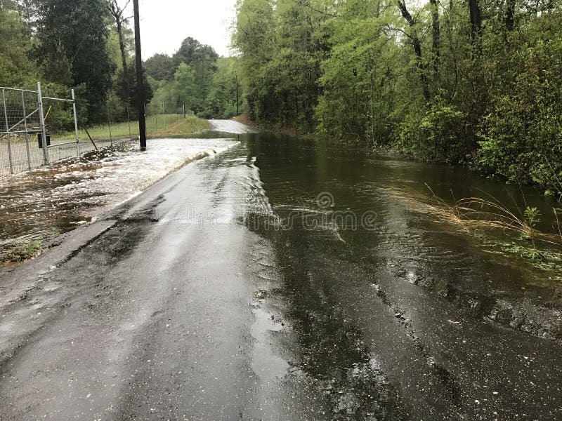 Water Flowing Over the Road Stock Photo - Image of massive, water ...