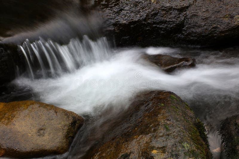 Stream and rocks stock image. Image of rocks, river, flowing - 3834793