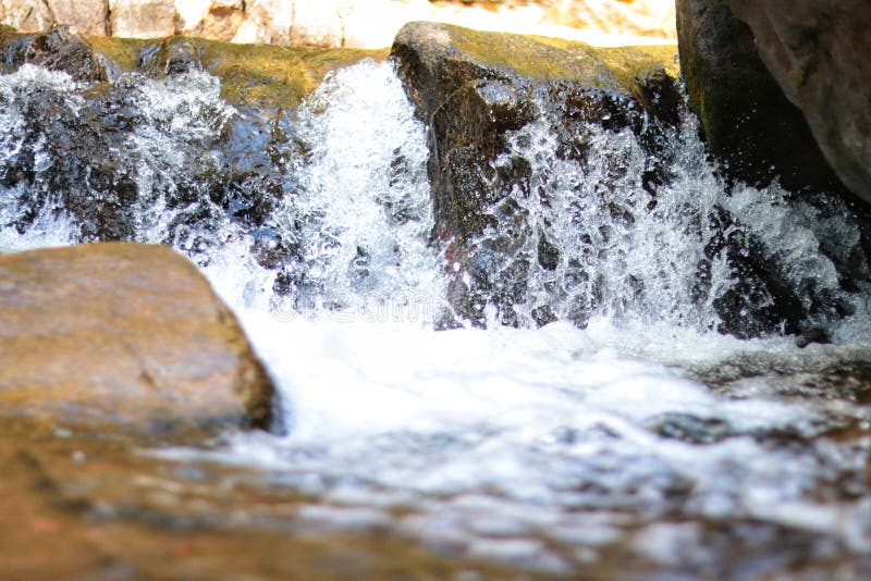 Water Flowing Over Rocks and Waterfall Stock Photo - Image of fall ...