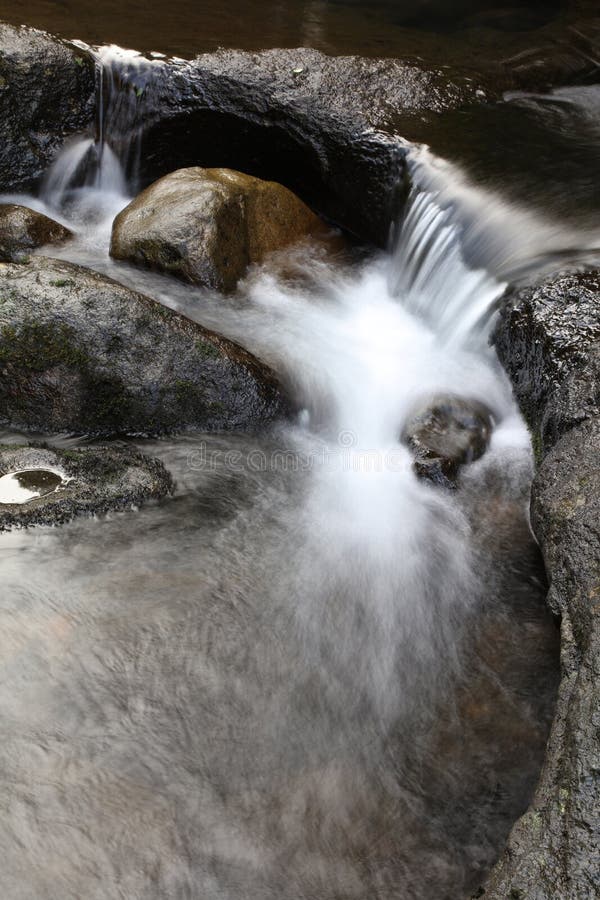 Water over rocks stock photo. Image of foam, stream, swiftly - 2751684